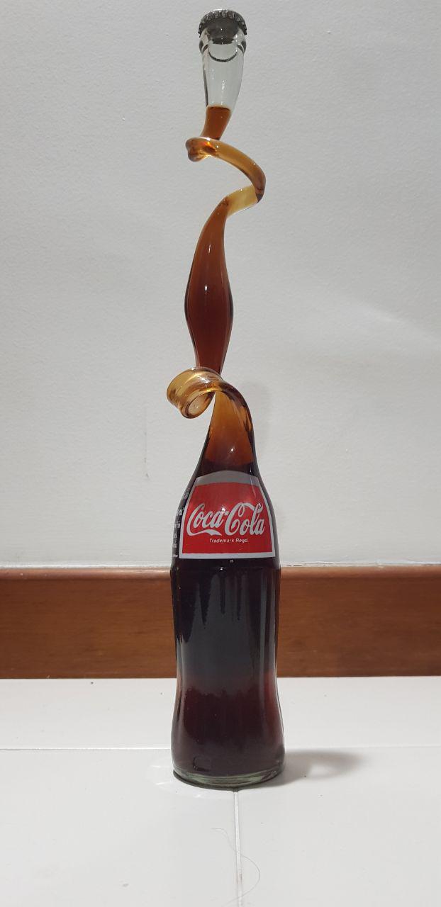 Have you seen these stretched neck Coke bottles? – The UrbanWire